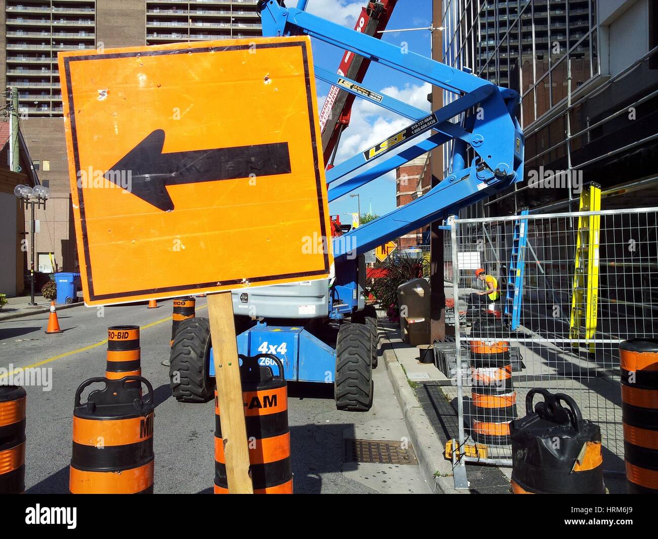 Yellow man and yellow arrow hi-res stock photography and images - Alamy
