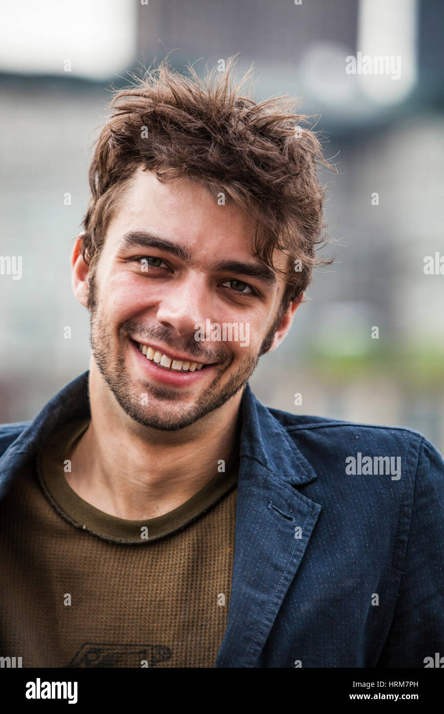 A portrait of a smiling young man Stock Photo - Alamy