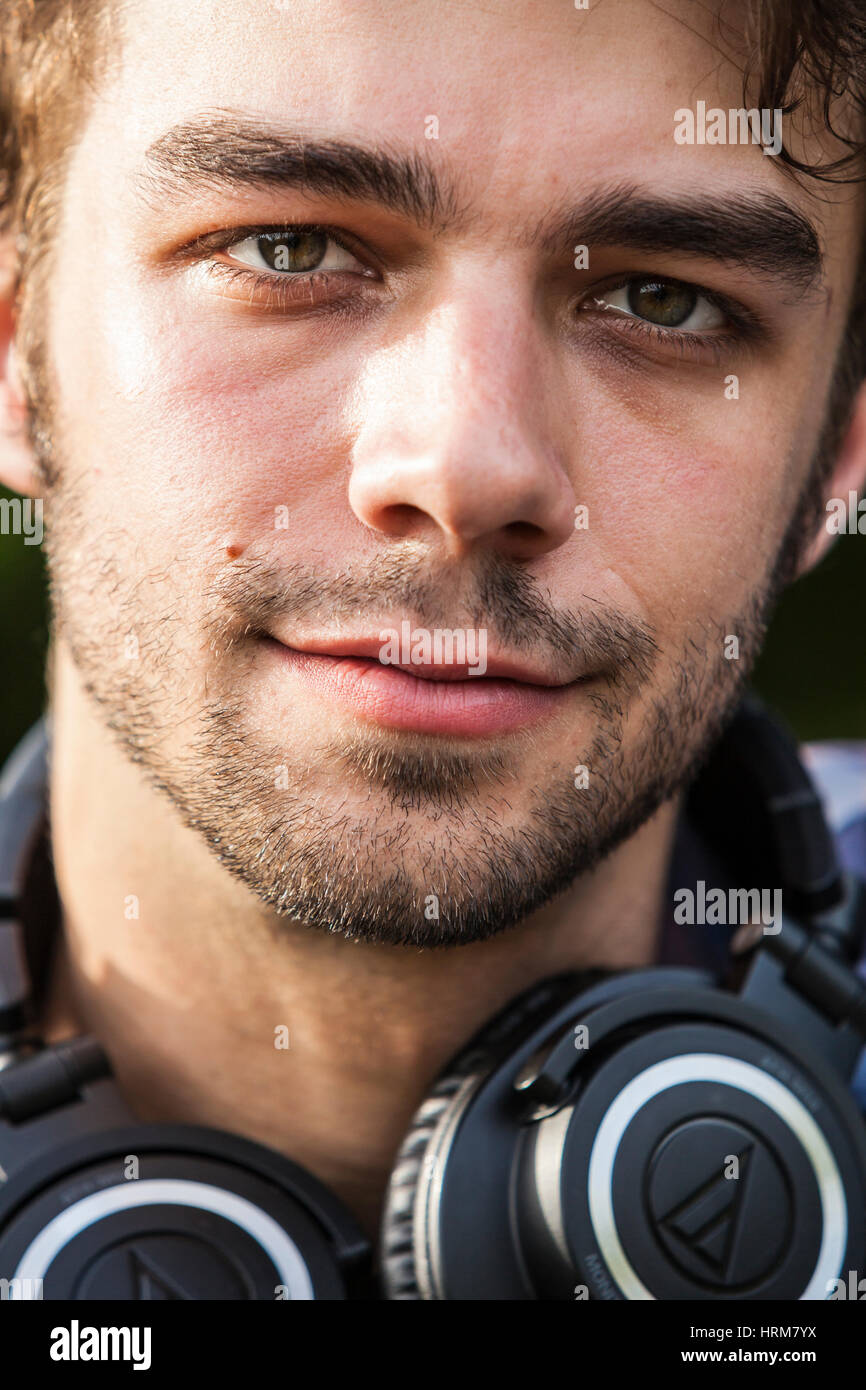 A closeup portrait of a slightly scruffy young man Stock Photo - Alamy