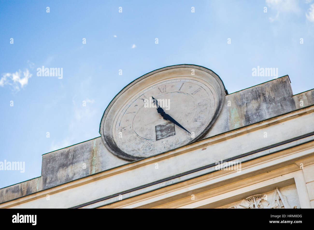 ancient clock on white building Stock Photo - Alamy