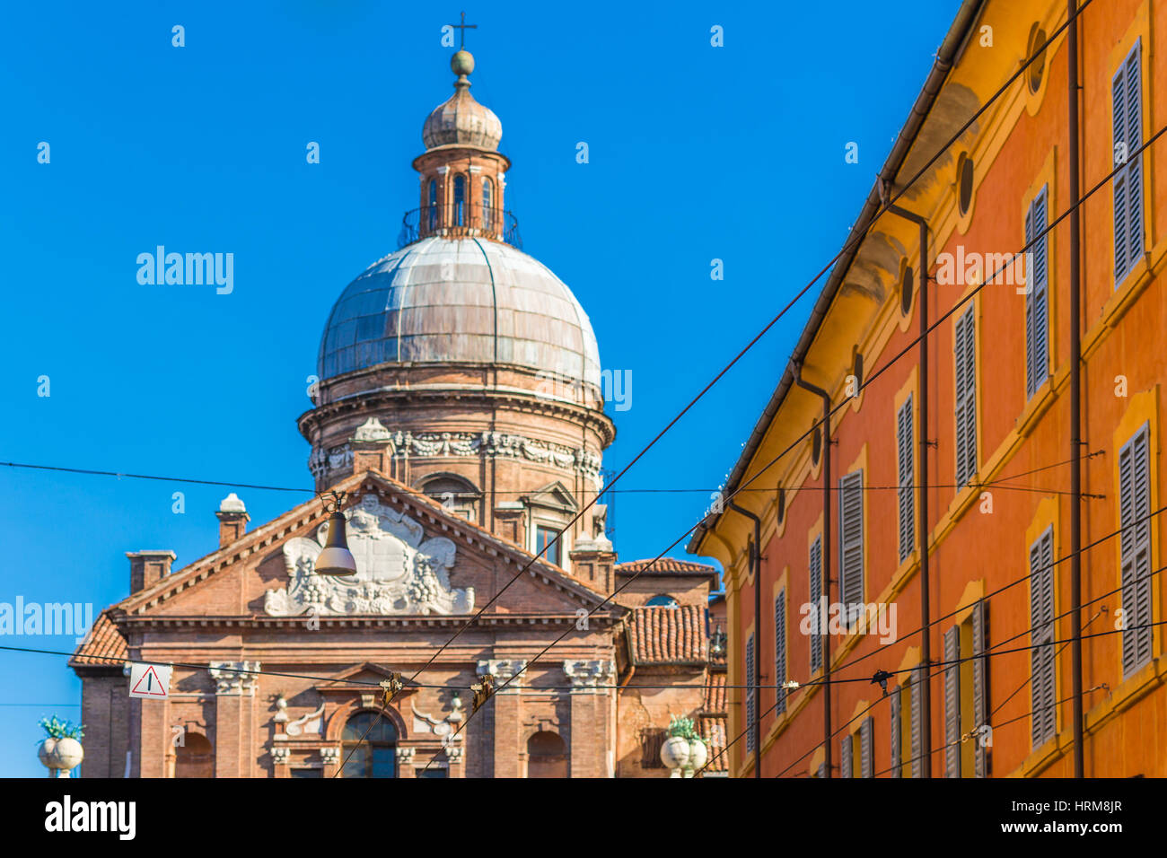 Church and colorful buildings of Modena in Italy Stock Photo - Alamy