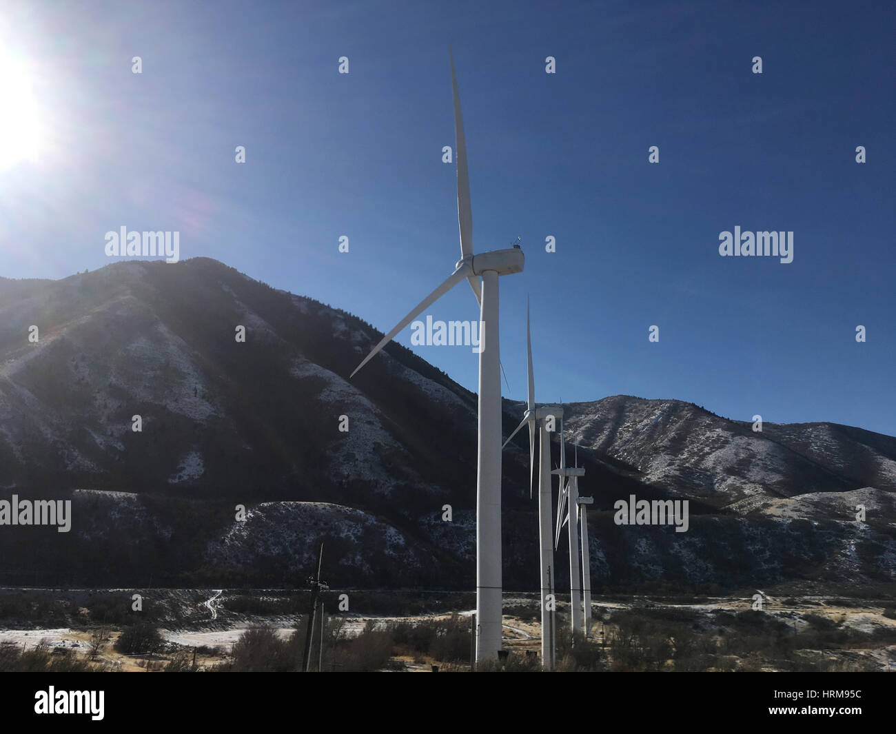 Lens Flare And Bright Sun Shine On Wind Farm Spanish Fork Canyon Spanish Fork Utah Wind lens-flare-and-bright-sun-shine-on-wind-farm-spanish-fork-canyon-spanish-fork-utah-wind