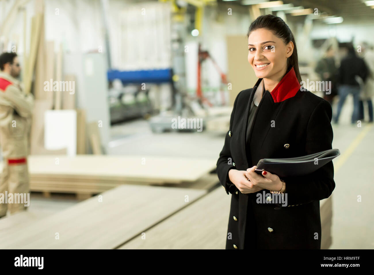 Female inspector at furniture industry Stock Photo - Alamy
