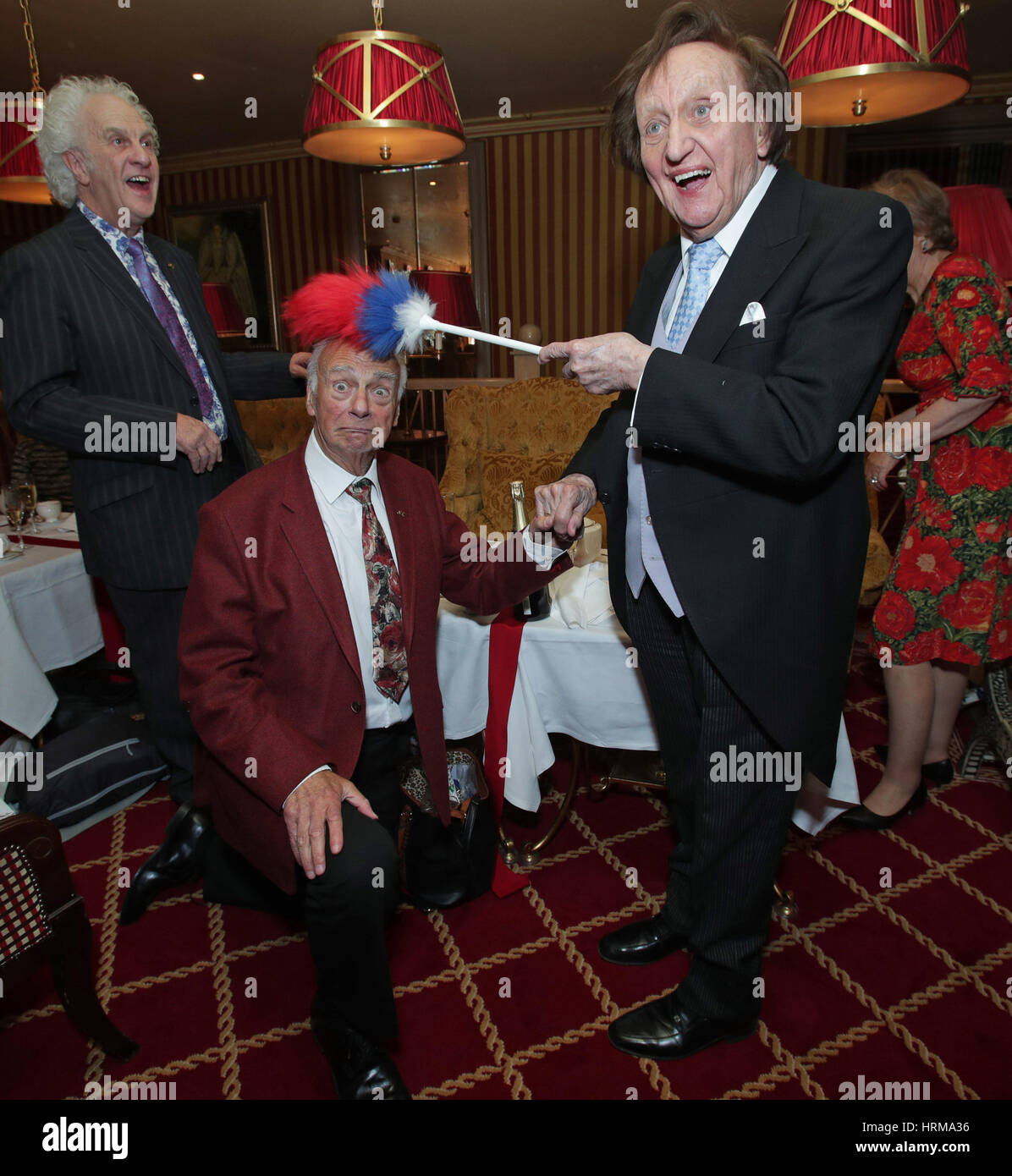 Veteran entertainer Sir Ken Dodd (right) 'knights' Roy Hudd during a ...
