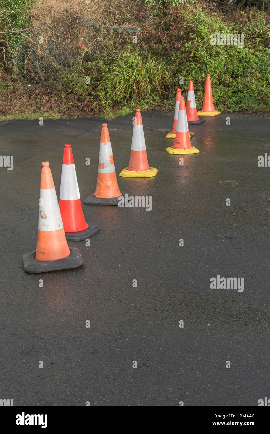 Line of road cones separating off an area from pedestrian access Stock ...