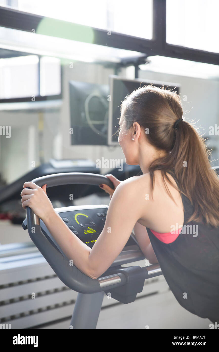 Young woman exercise on the treadmill at the gym Stock Photo - Alamy
