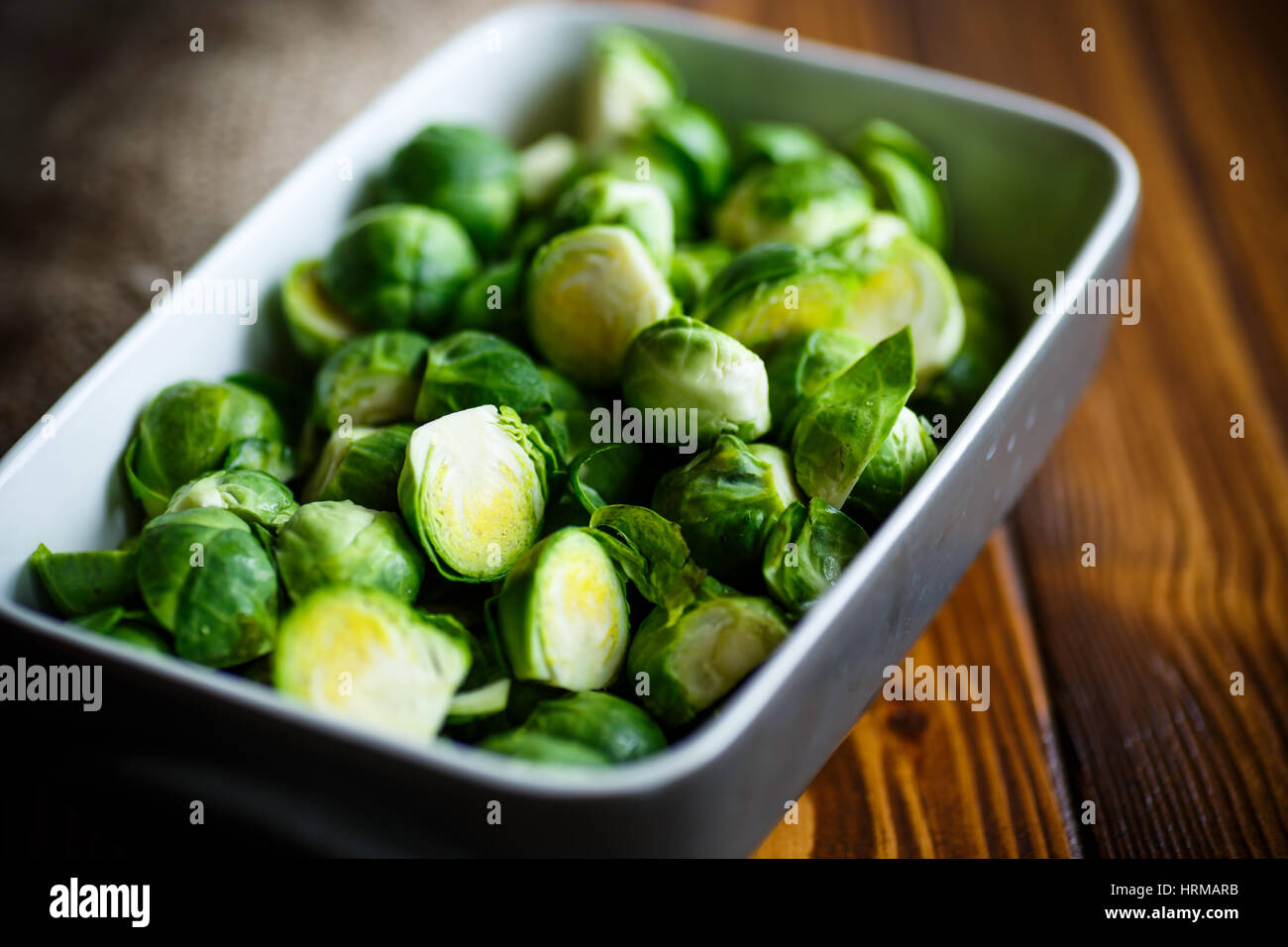 raw Brussels sprouts in ceramic form Stock Photo - Alamy