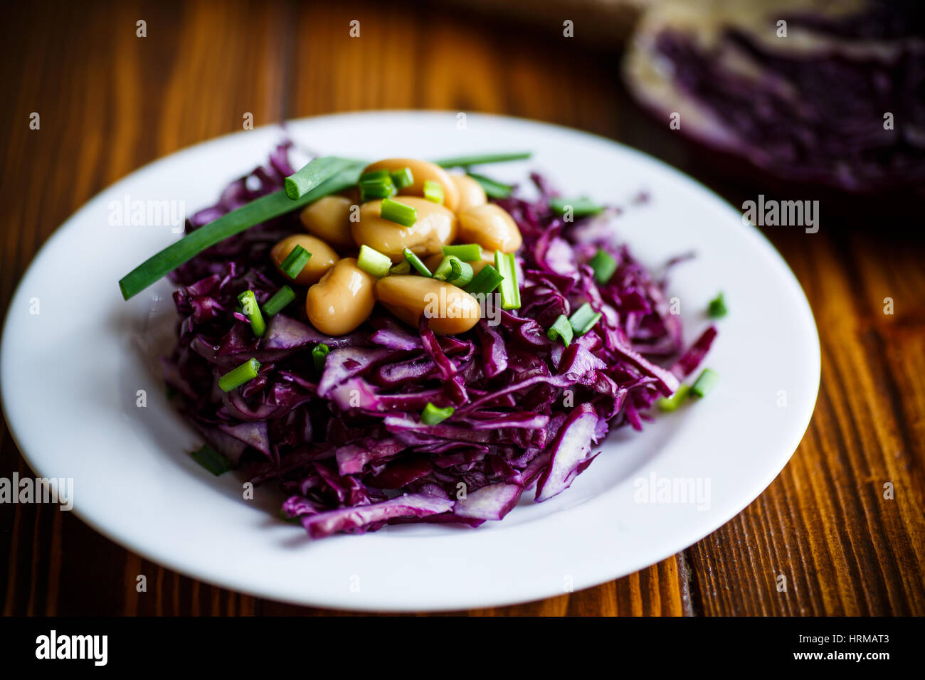 fresh salad of red cabbage with boiled beans Stock Photo - Alamy
