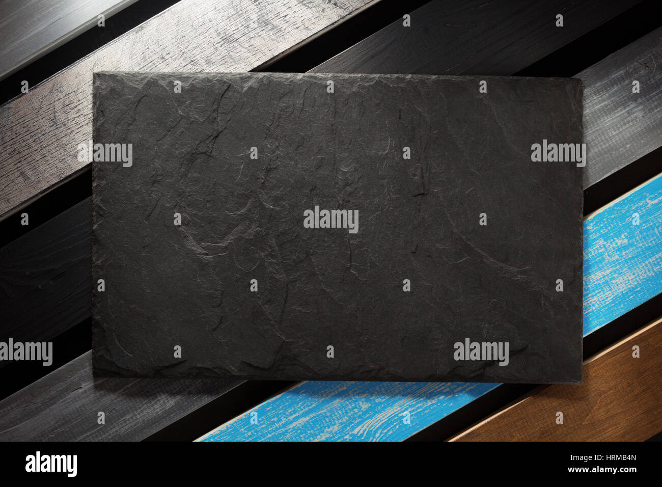slate signboard at black background texture Stock Photo - Alamy