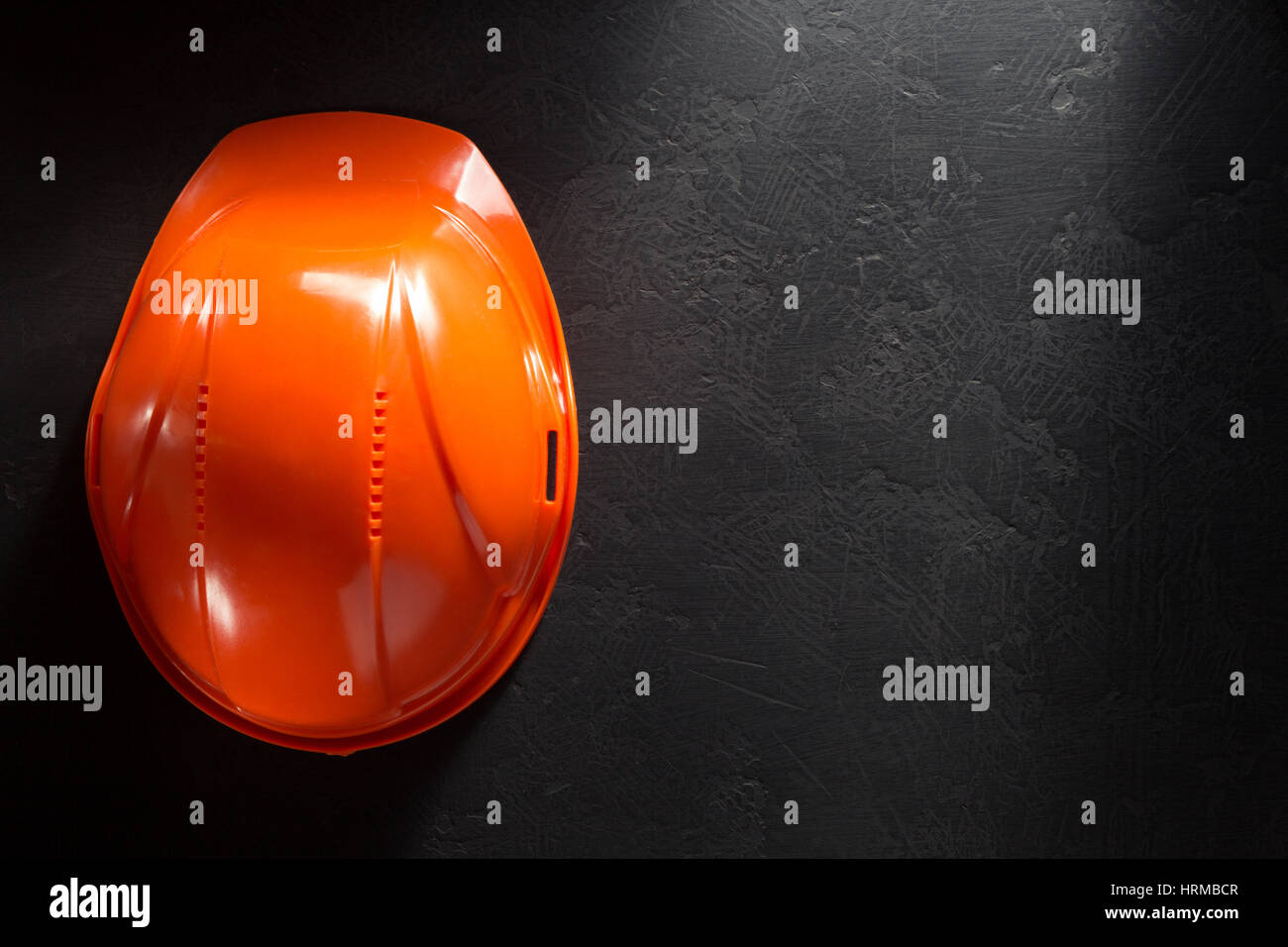 construction helmet on black background Stock Photo - Alamy