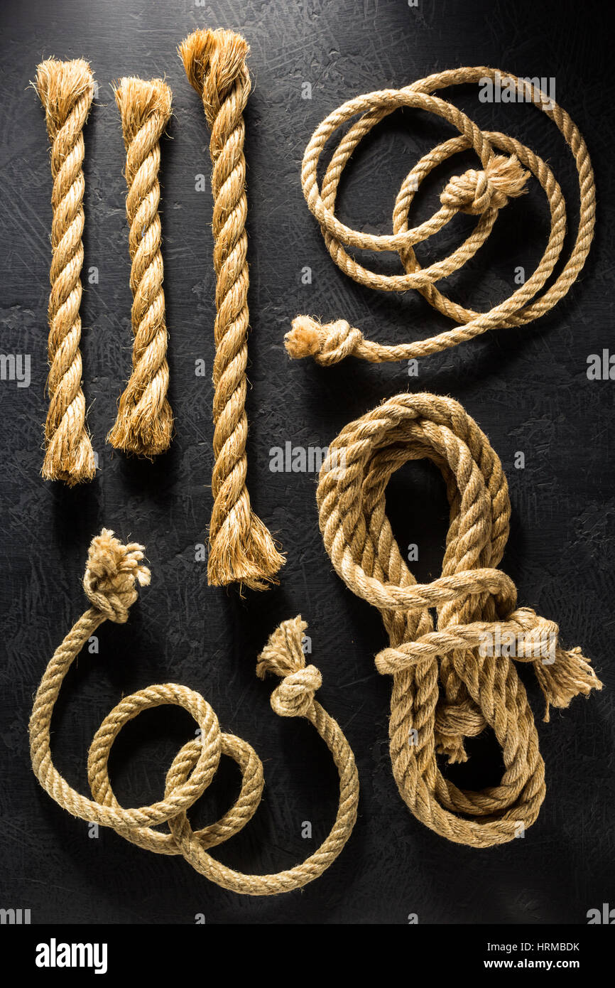 ship rope at black background texture Stock Photo - Alamy