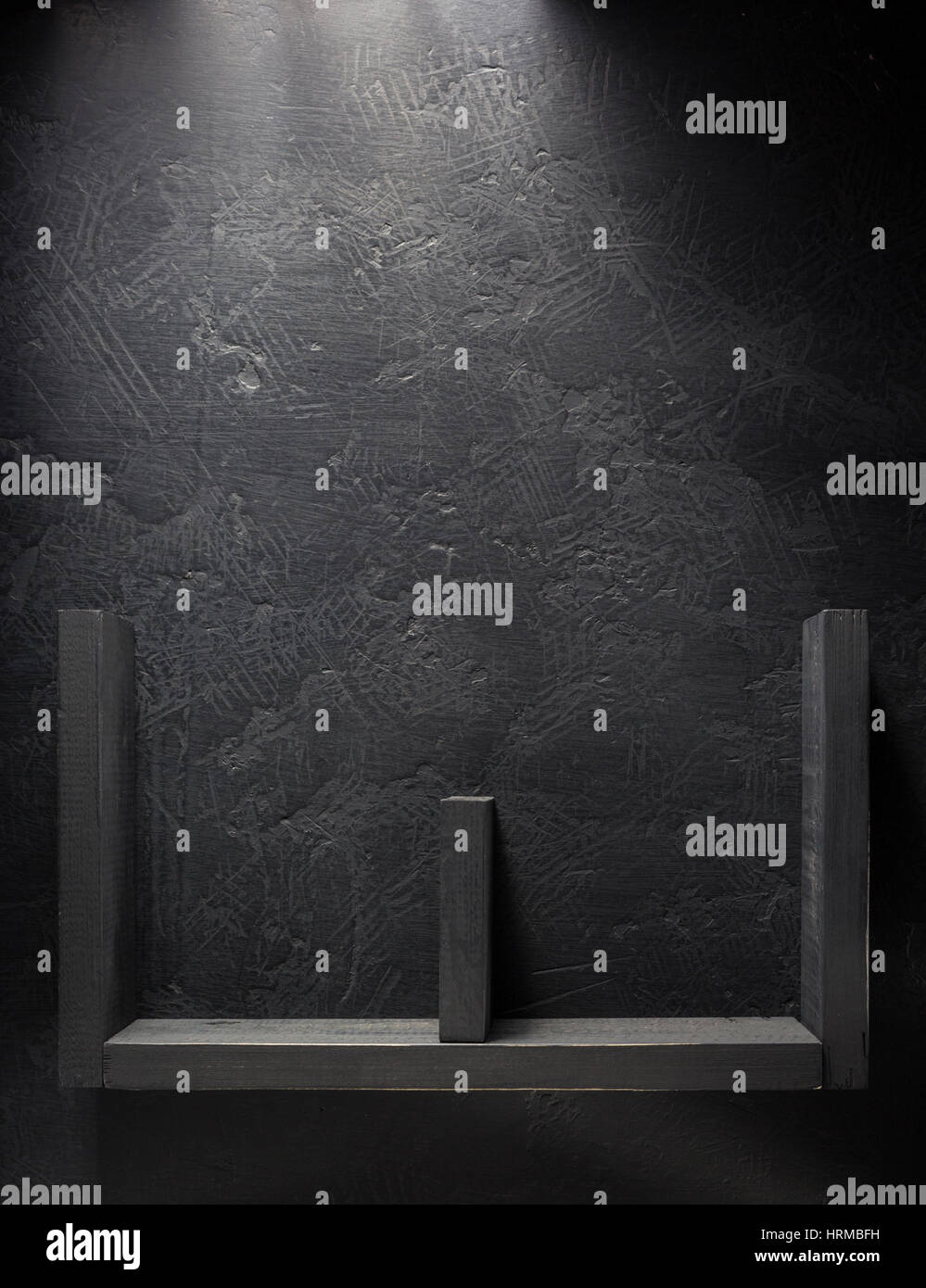 shelf and black wall on wooden background Stock Photo - Alamy