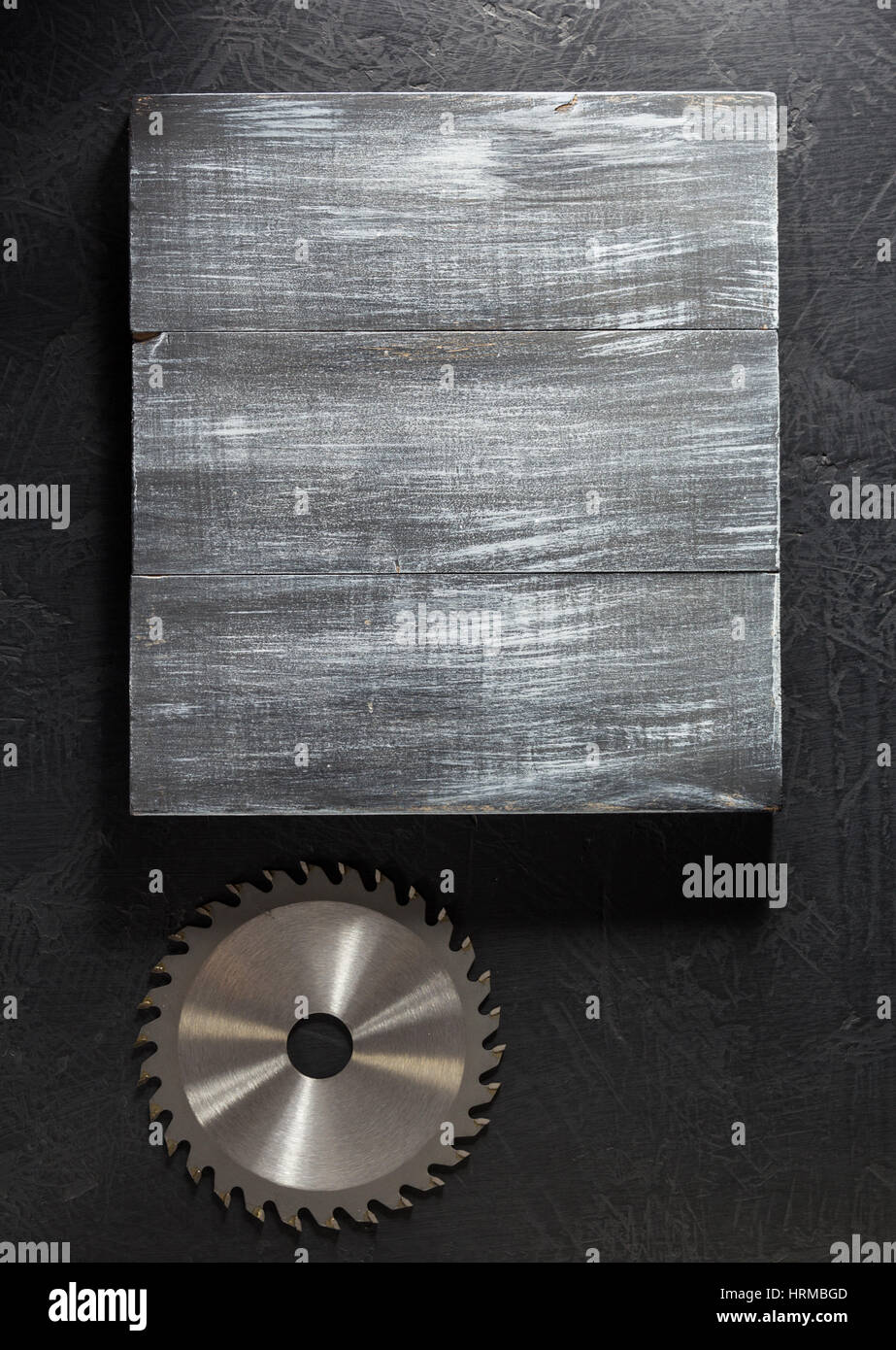 circular saw blade at black background texture Stock Photo - Alamy