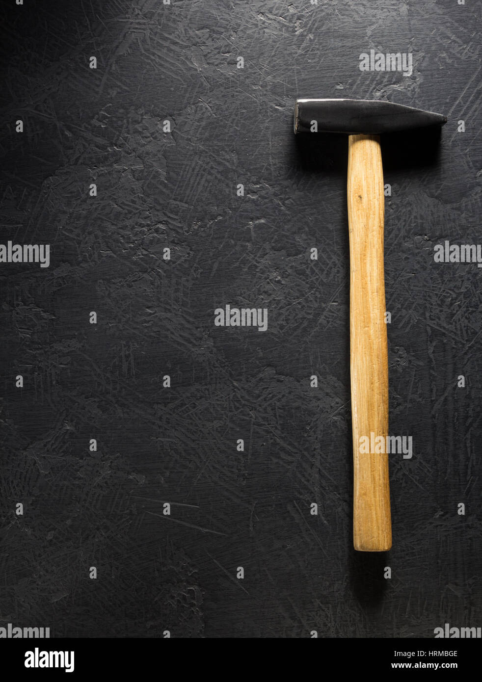 hammer tool at black background texture Stock Photo - Alamy