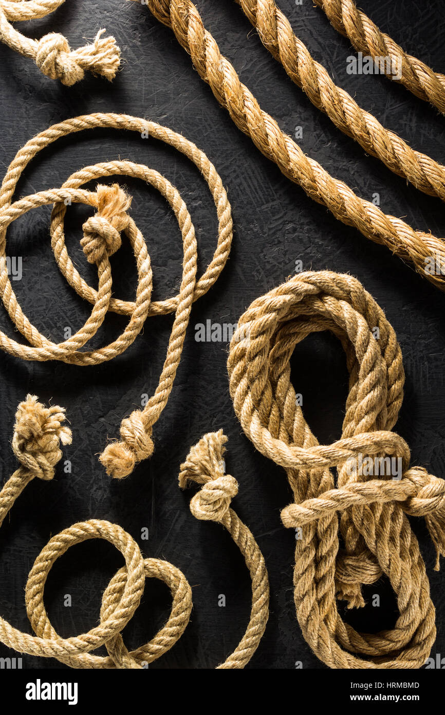 ship rope at black background texture Stock Photo - Alamy