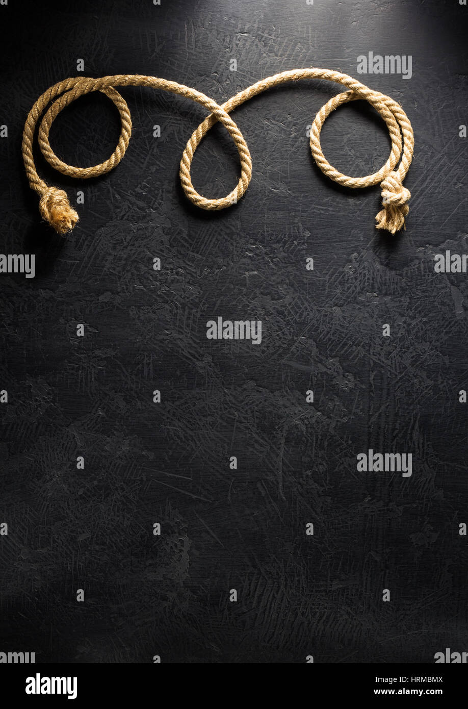 ship rope at black background texture Stock Photo - Alamy