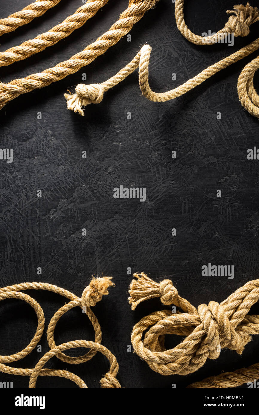 ship rope at black background texture Stock Photo - Alamy