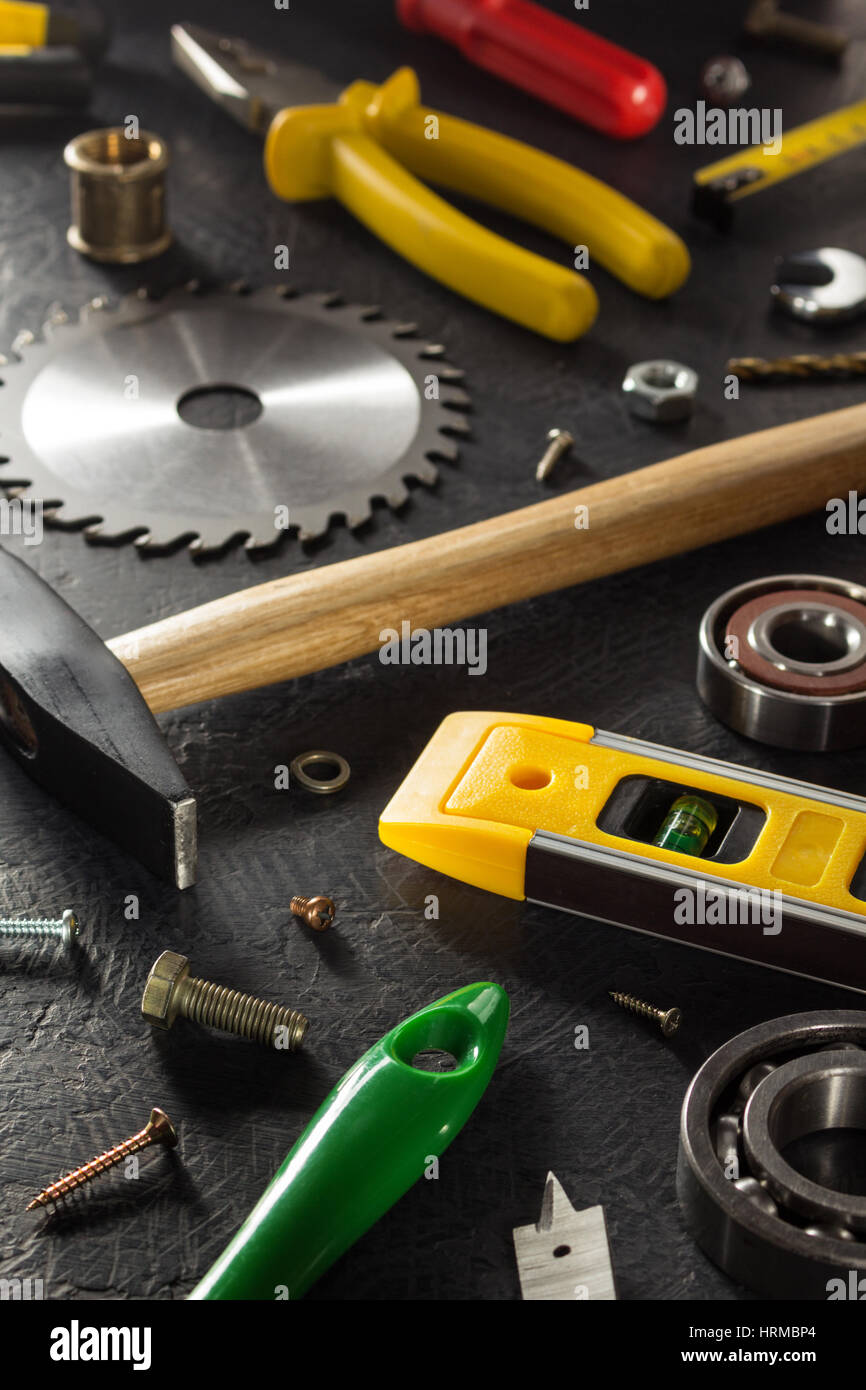 tools and instruments on black background Stock Photo - Alamy
