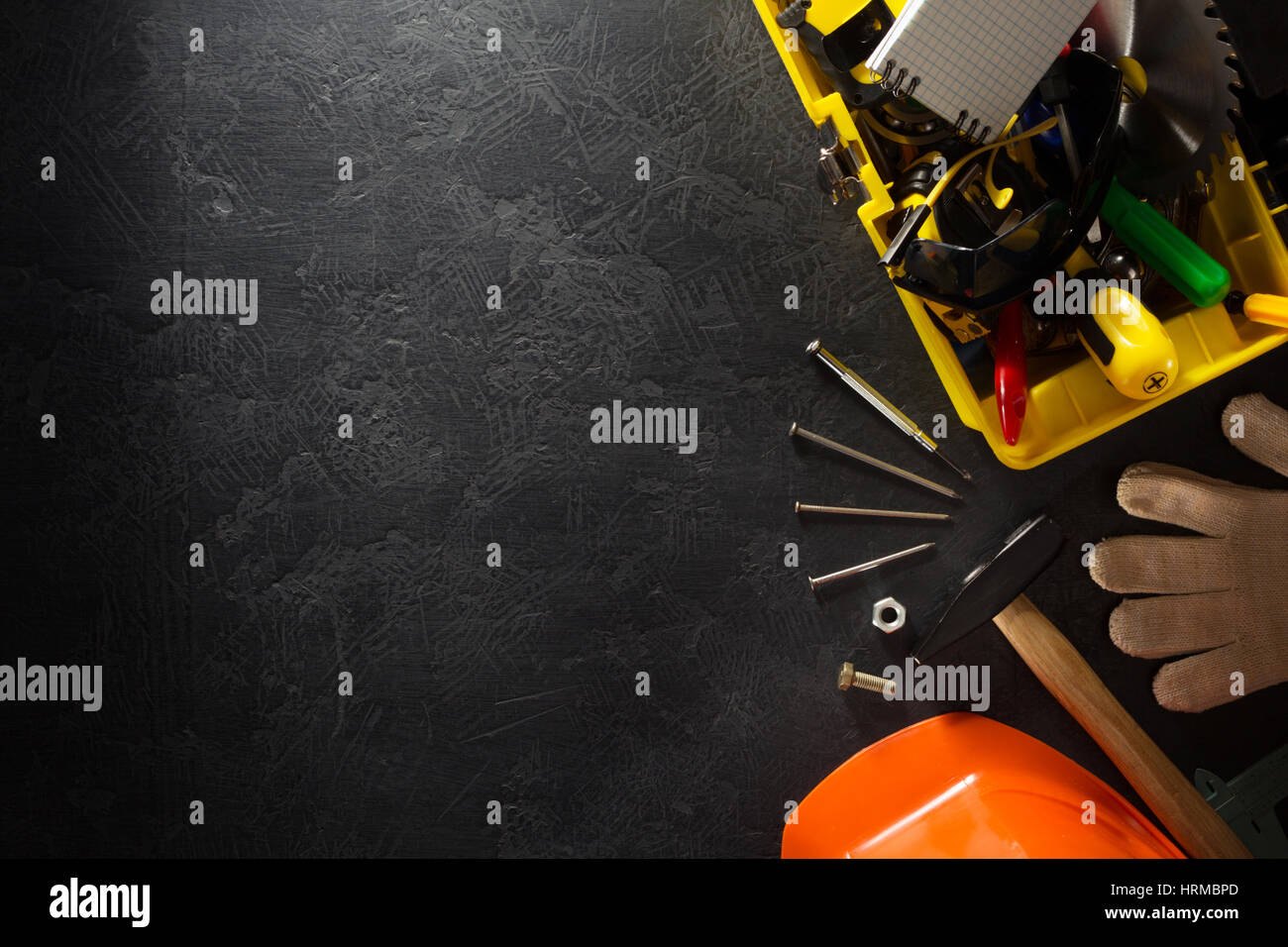 tools and instruments with toolbox on black background Stock Photo - Alamy