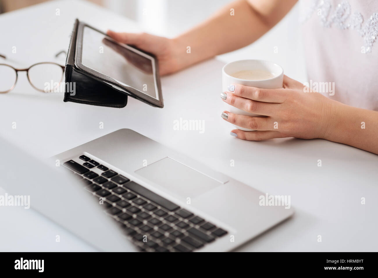 Young businesswoman having a busy morning Stock Photo - Alamy