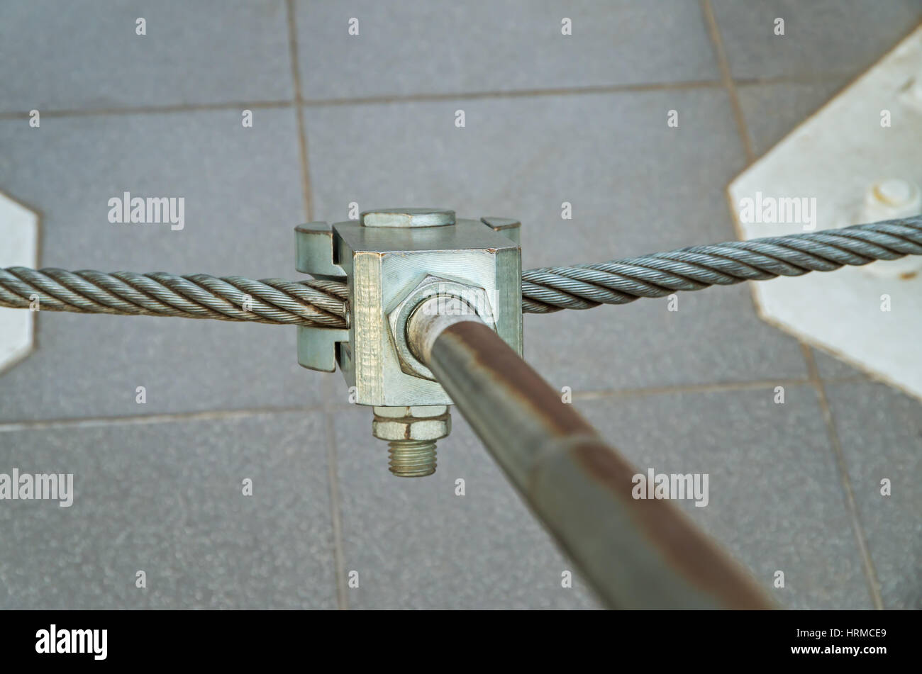 Metal mount consisting of bolts and cables to secure the radio ...