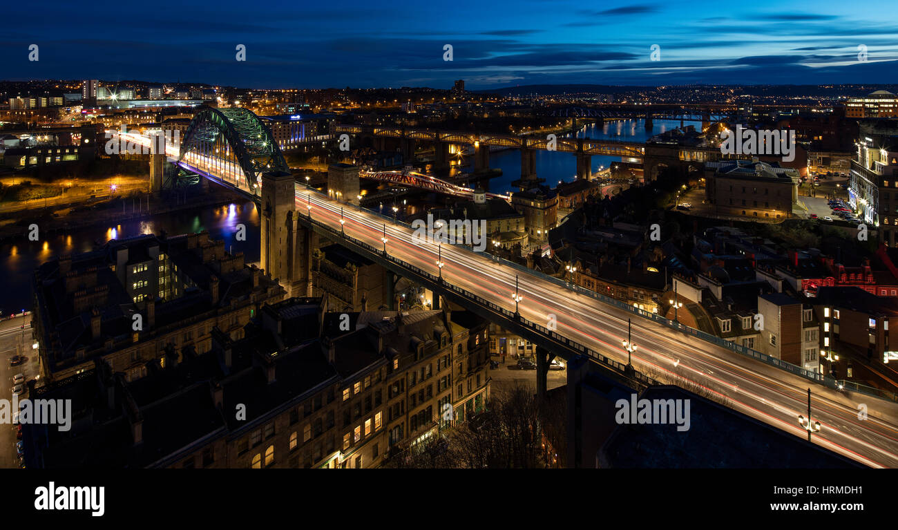 A view at dusk of the Newcastle bridges and quayside in Newcastle Upon ...