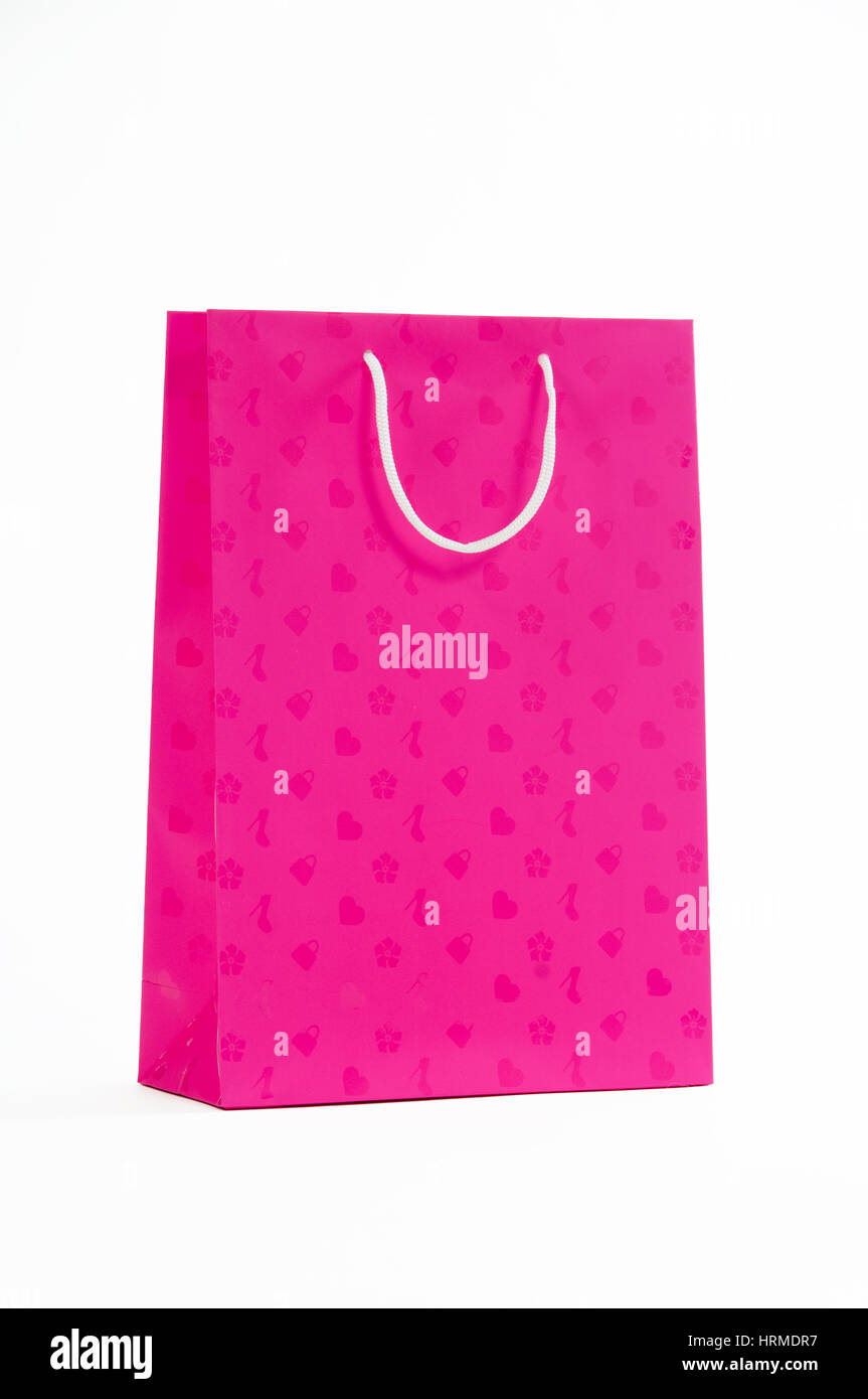 Pink paper bag isolated on white background Stock Photo - Alamy