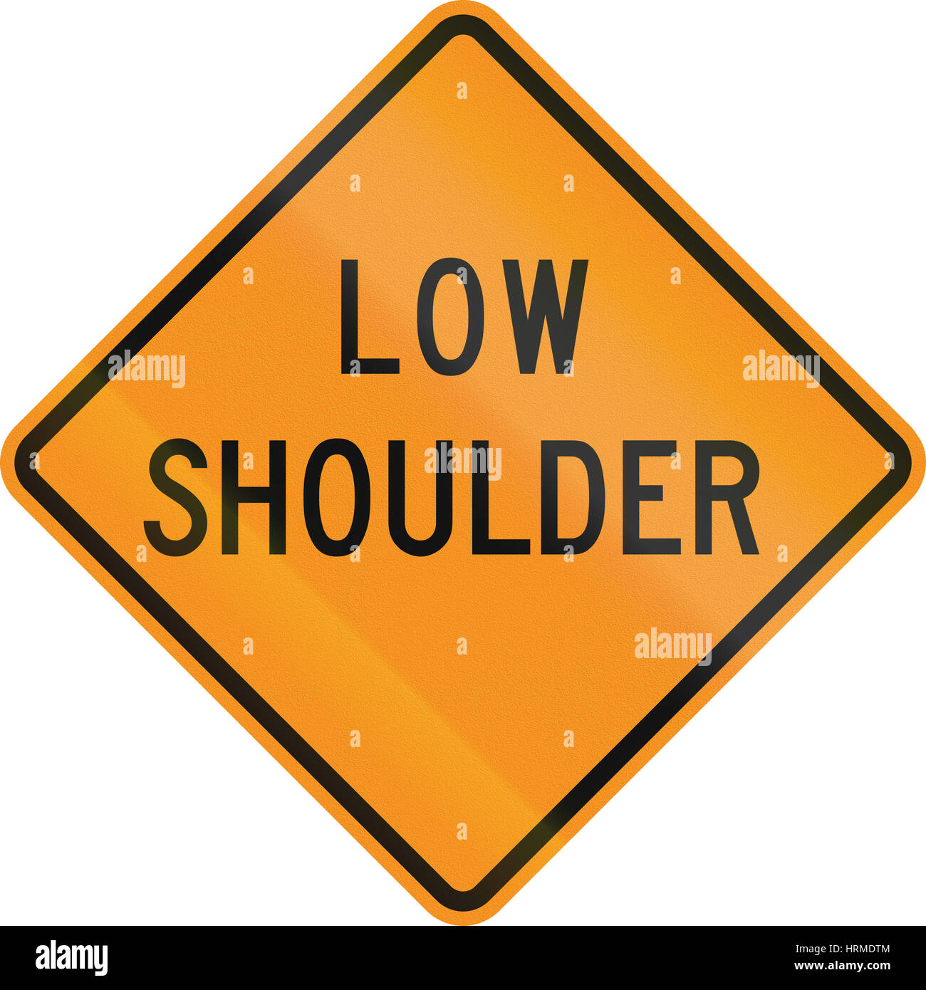 United States MUTCD road sign - Low shoulder Stock Photo - Alamy