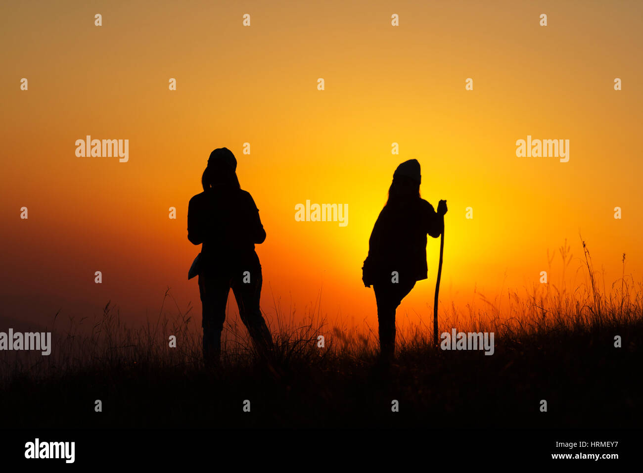 Silhouette Of People having fun at sunset time Stock Photo - Alamy