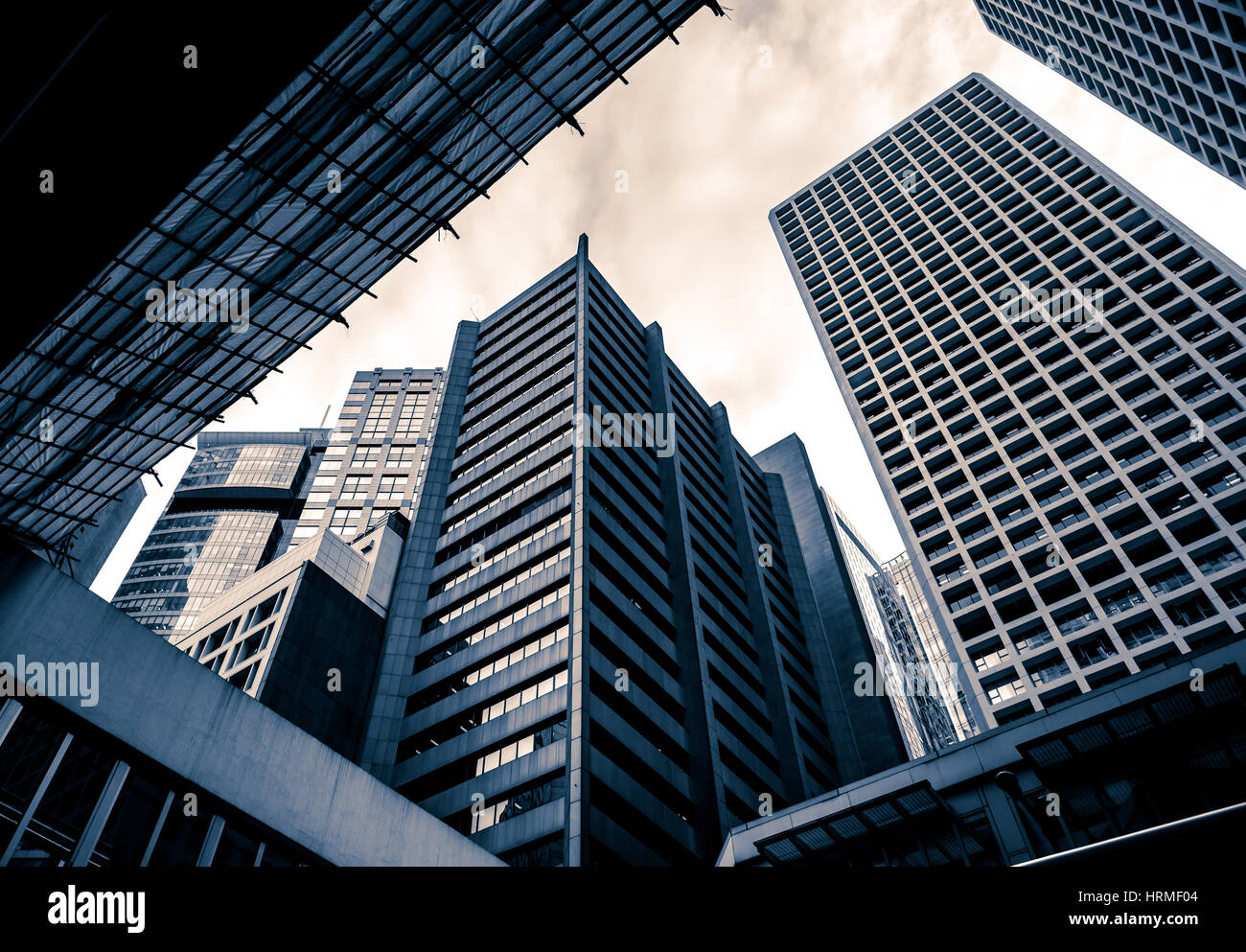 Modern office building close up in sunlight Stock Photo - Alamy