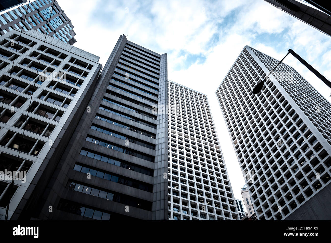 Modern office building close up in sunlight Stock Photo - Alamy