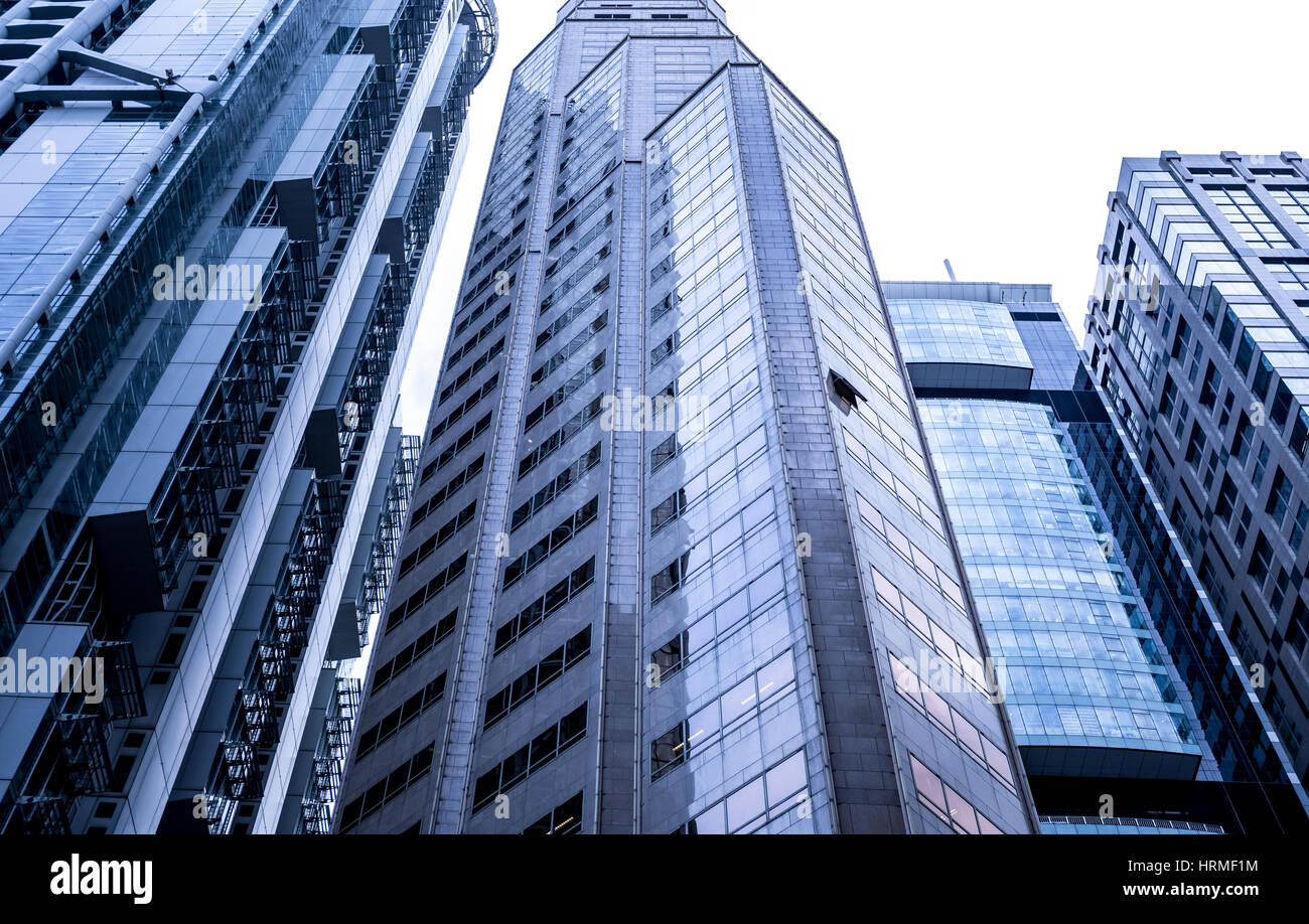 Modern office building close up in sunlight Stock Photo - Alamy