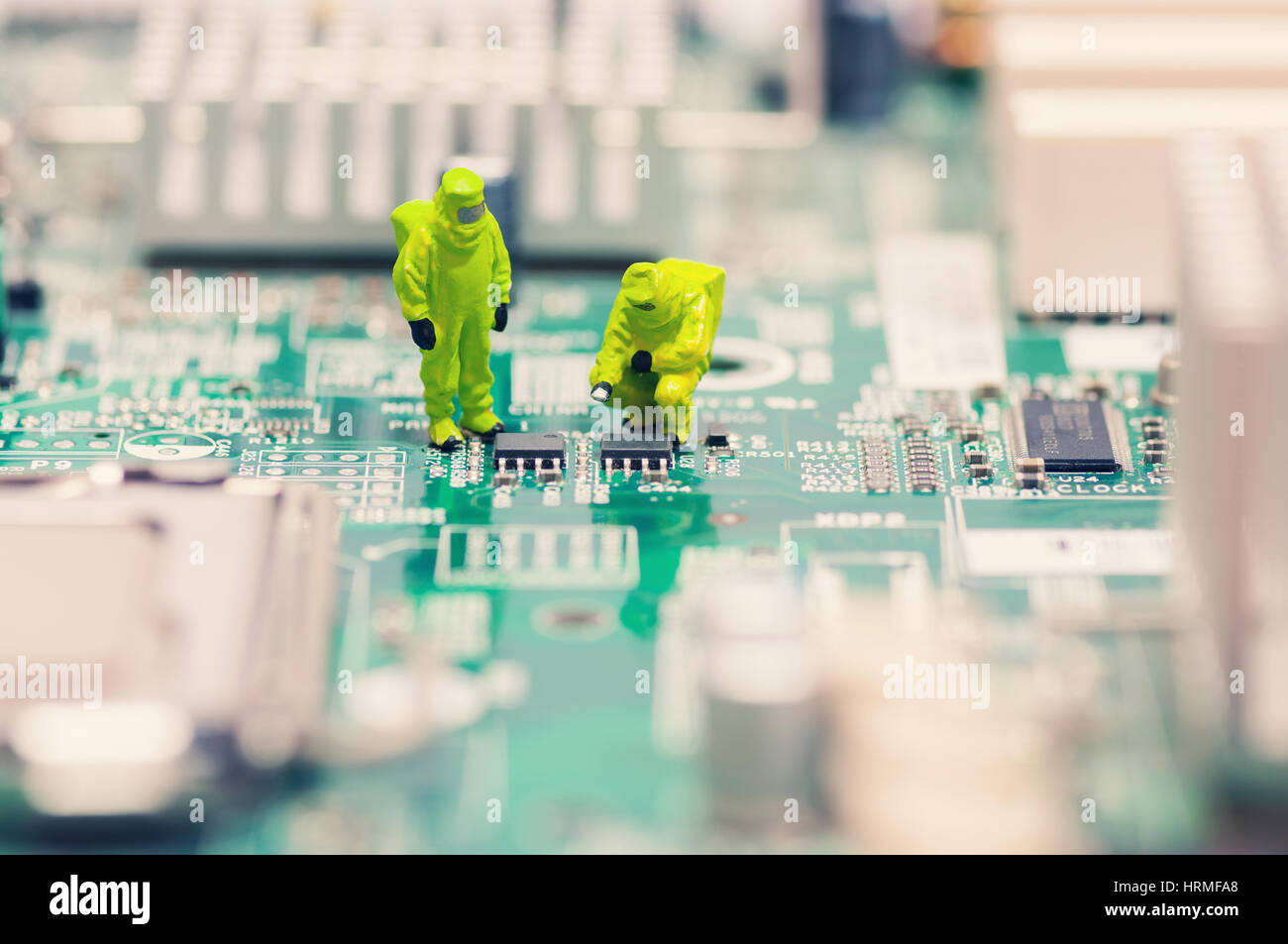 Technicians repairing circuit board Stock Photo - Alamy