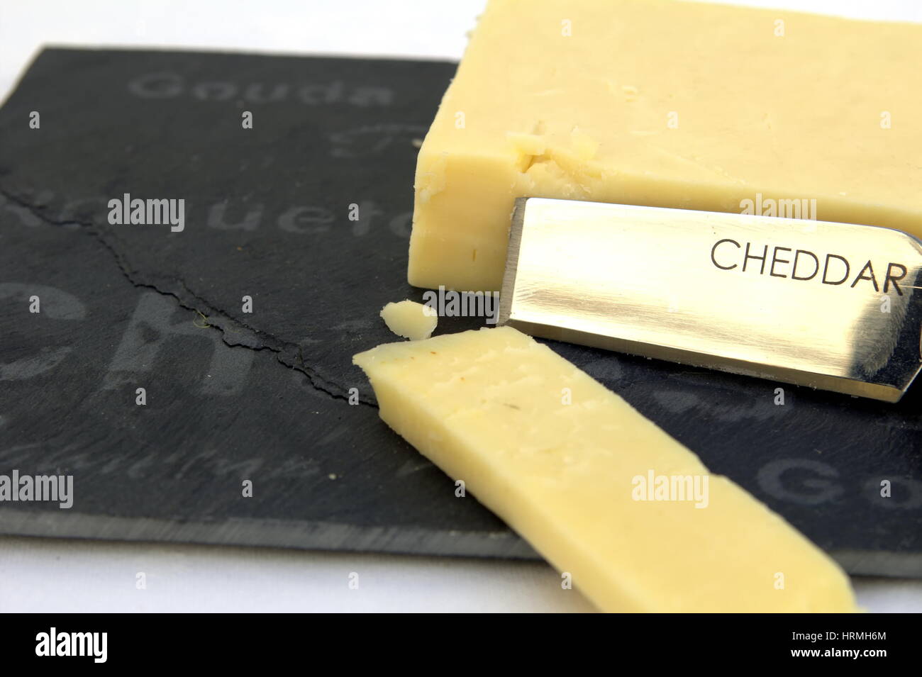A wedge of cheddar cheese hi-res stock photography and images - Alamy