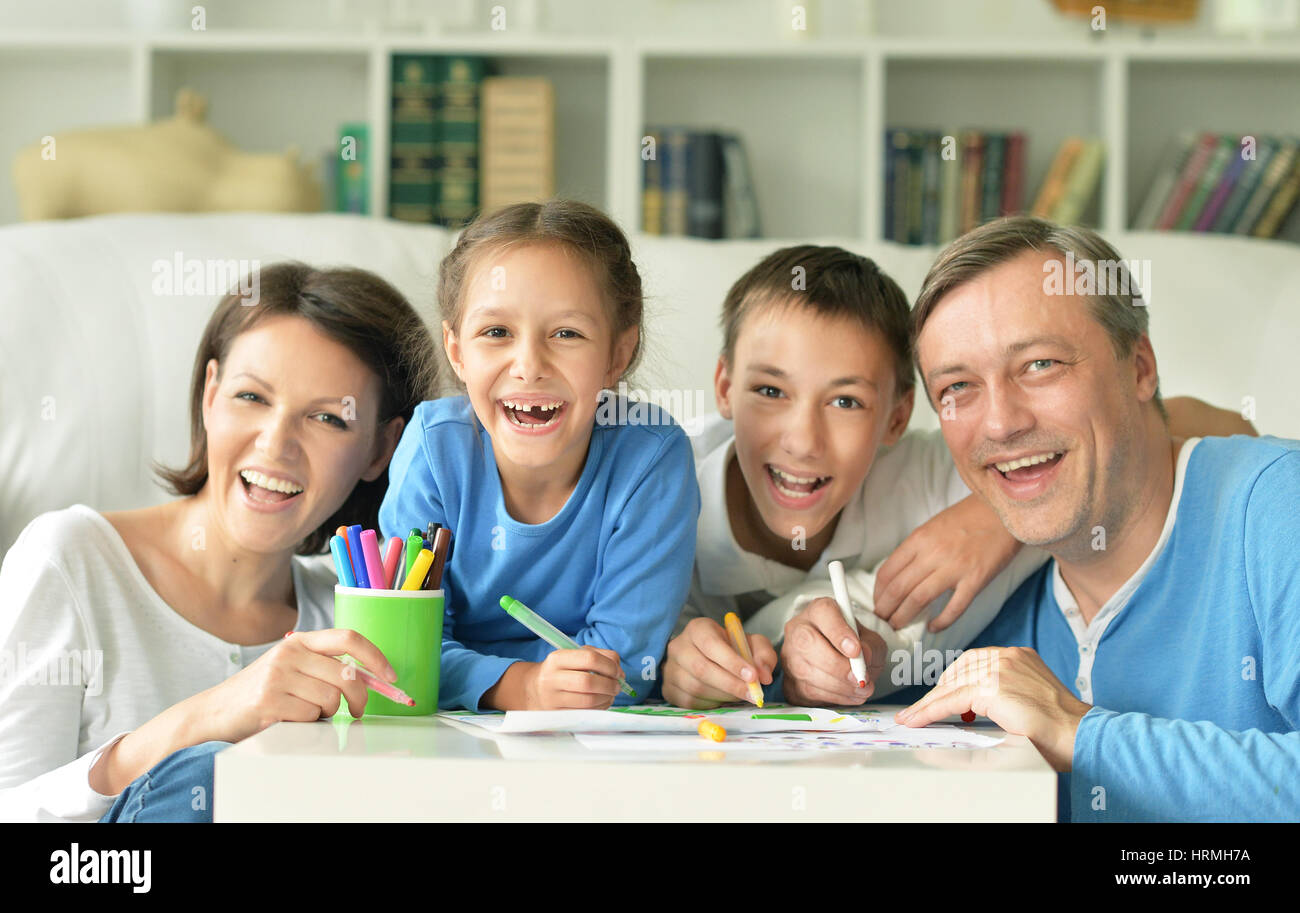 Big happy family drawing together hi-res stock photography and images ...
