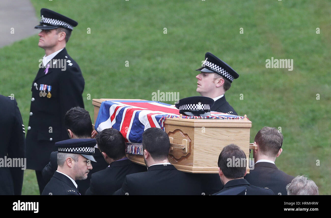 The coffin of Pc Gavin Smith who died of cancer aged 34, is carried ...
