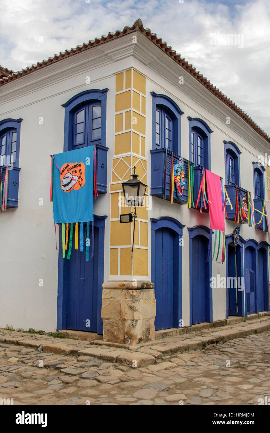 The typical portuguese style colorful colonial buildings on a stone ...