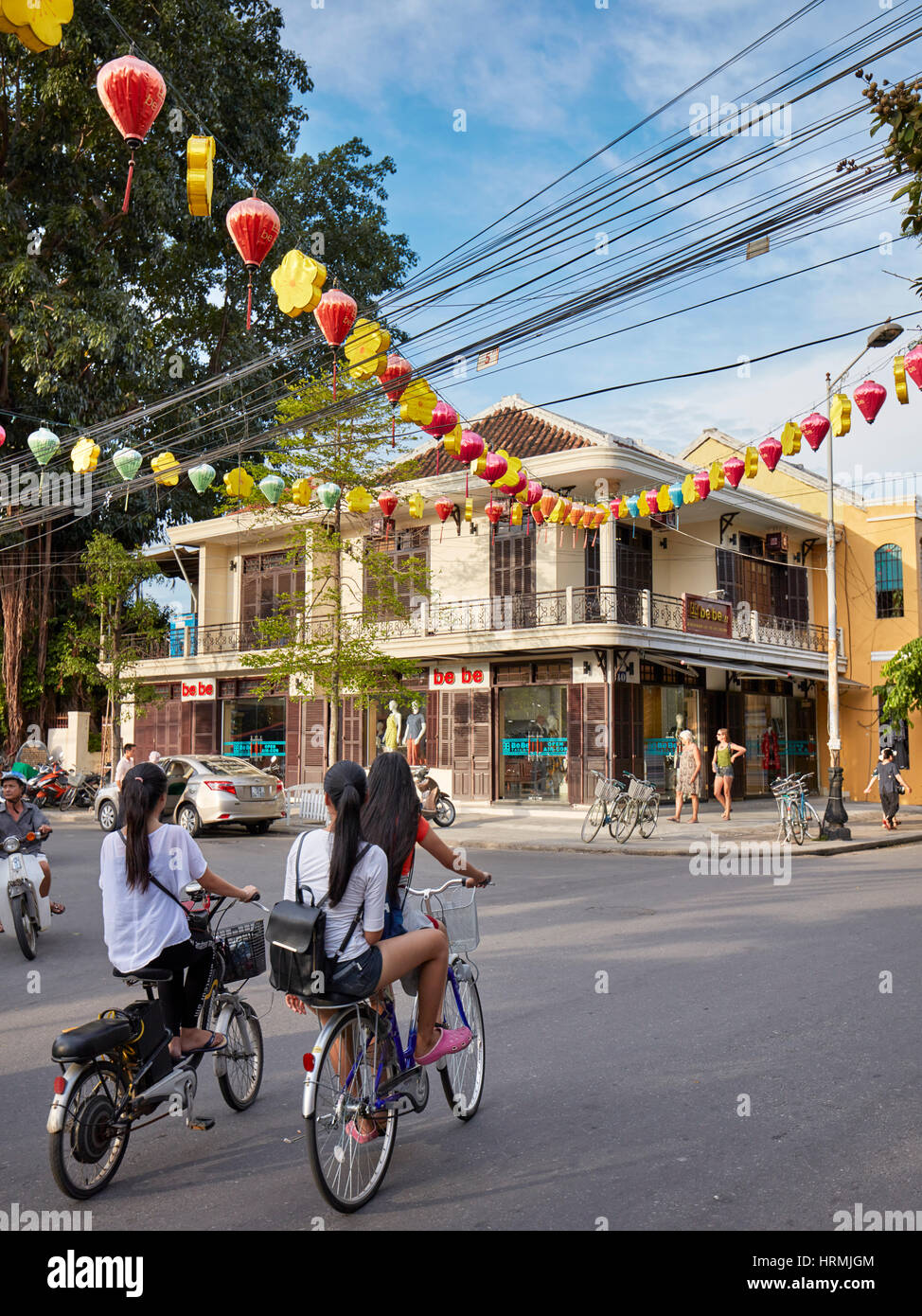 Girl riding bicycle in vietnamese hi-res stock photography and images ...