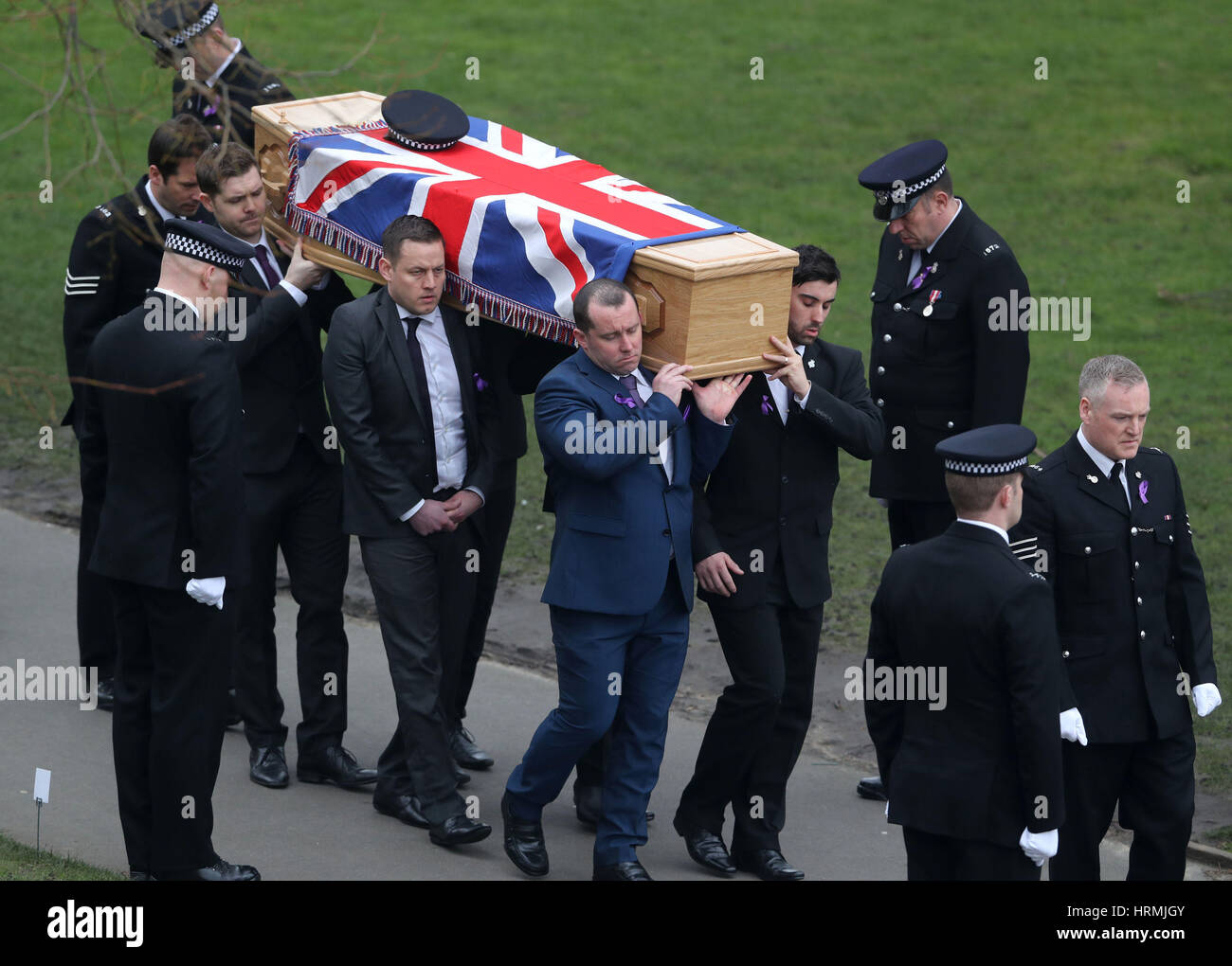 The coffin of Pc Gavin Smith who died of cancer aged 34, is carried ...