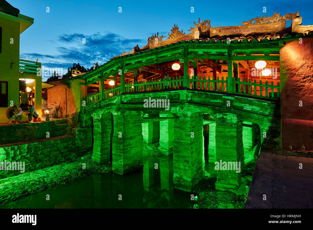 Japanese Covered Bridge illuminated at dusk. Hoi An Ancient Town, Quang ...