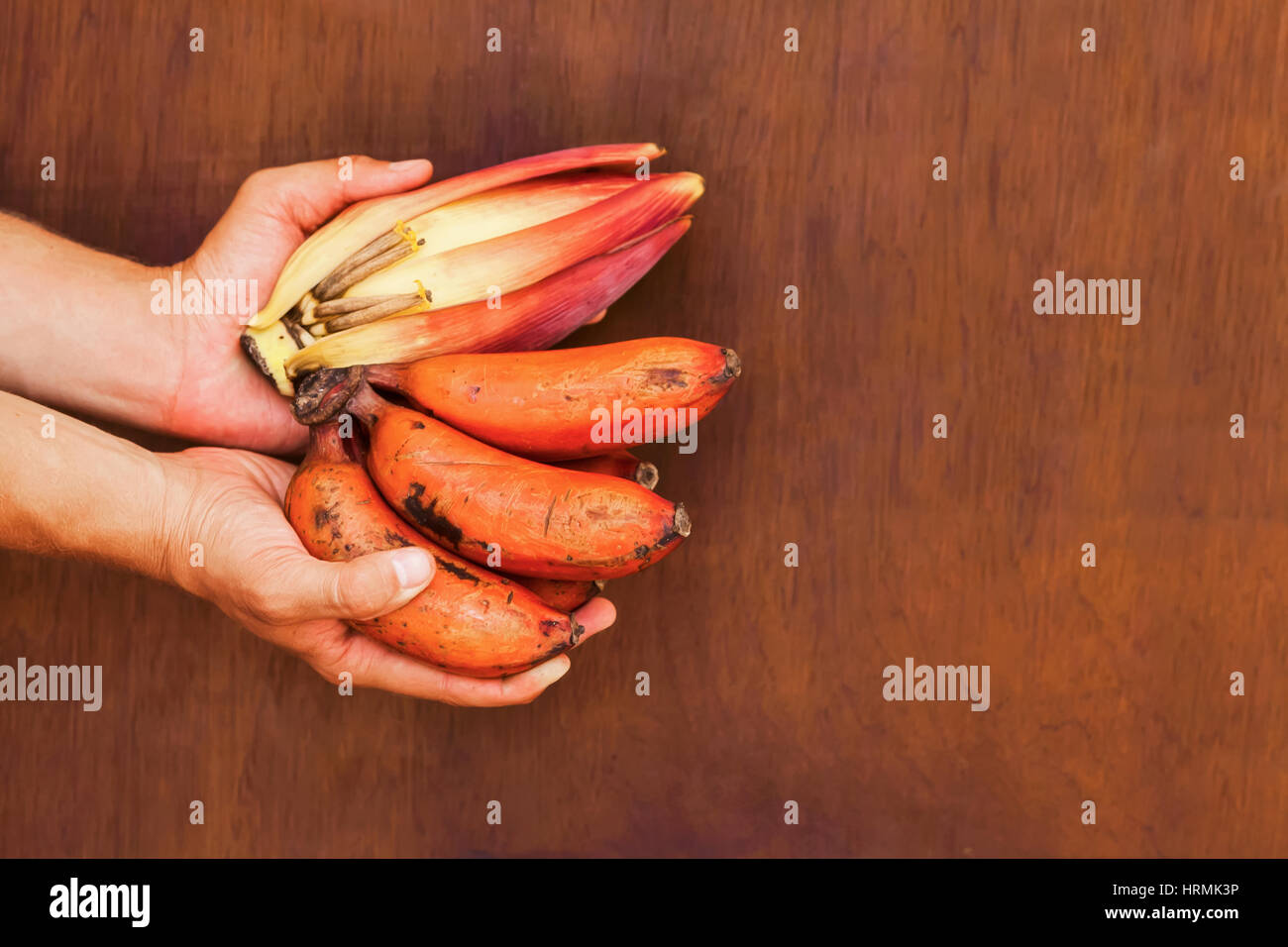 Banana hands bunches hi-res stock photography and images - Alamy