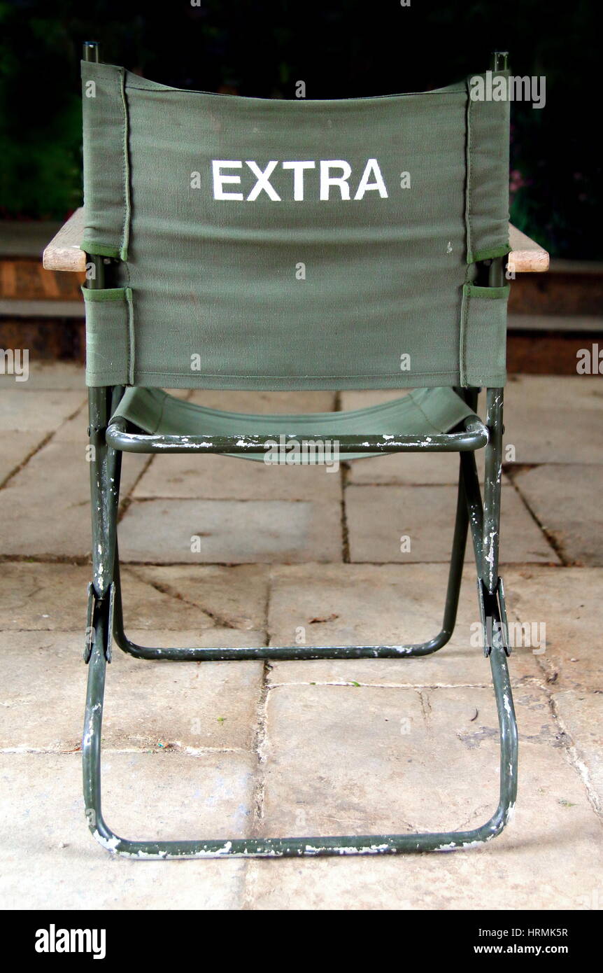 Directors chair with EXTRA on the back Stock Photo - Alamy