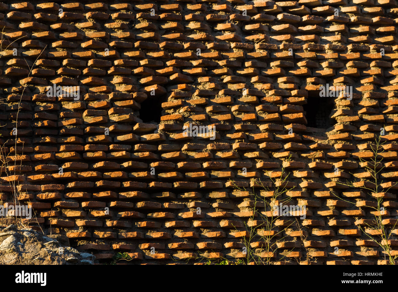Wall of bank in Rome from tiles. Making pattern or background Stock ...
