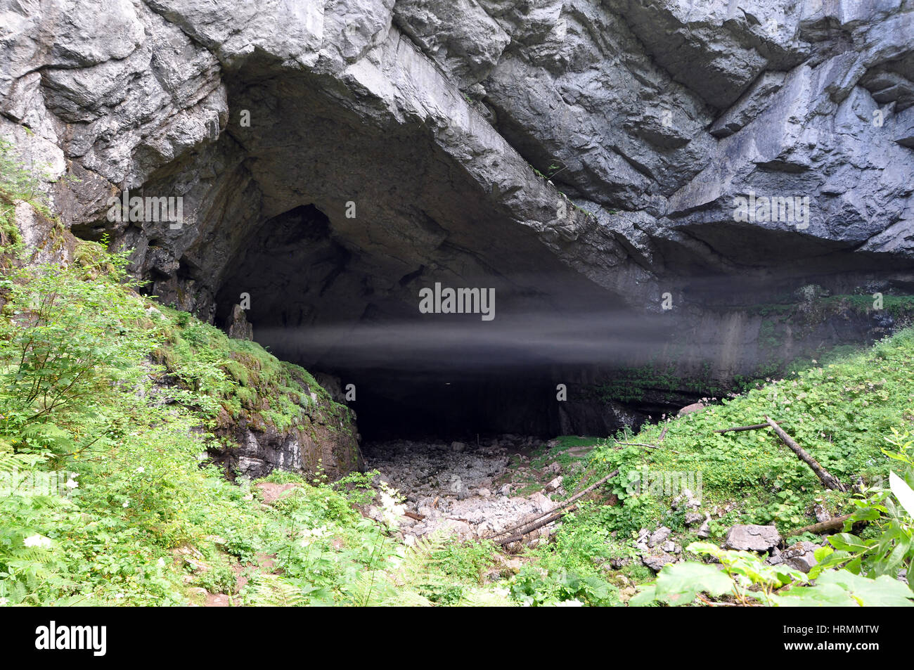 Mist in cave entrance Stock Photo - Alamy
