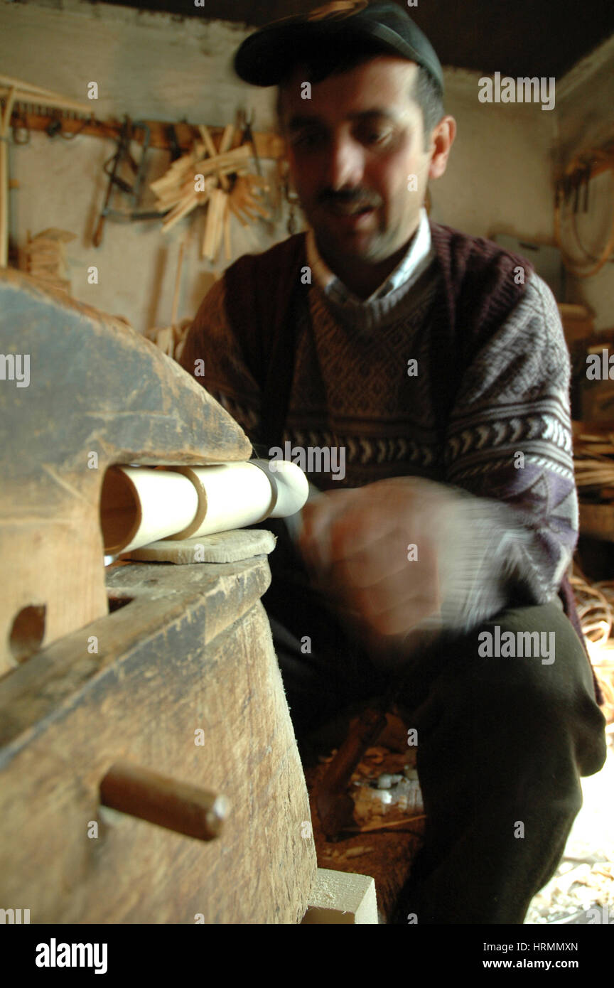 PATRAHAITESTI - CCA JUNE: Carpenter handcrafting a traditional Romanian ...