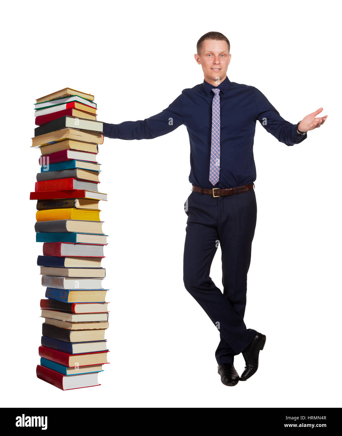 Young student telling about education process and stands in free pose ...