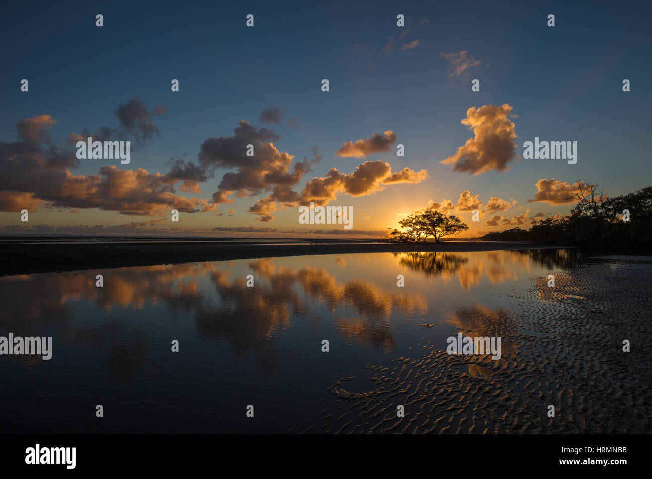 Sunrise over Nudgee Beach Stock Photo - Alamy