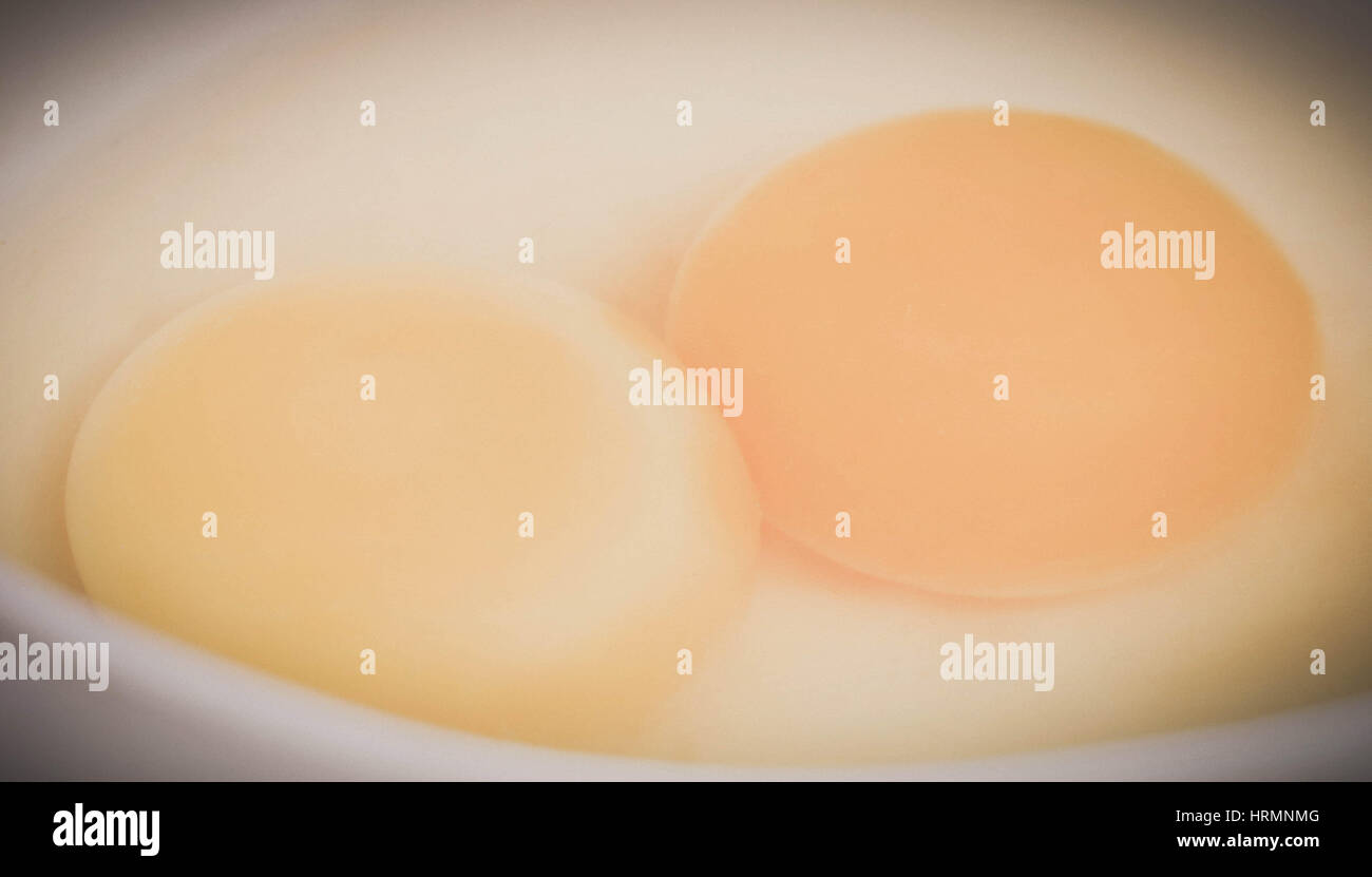 Two egg yolks in hi-res stock photography and images - Alamy