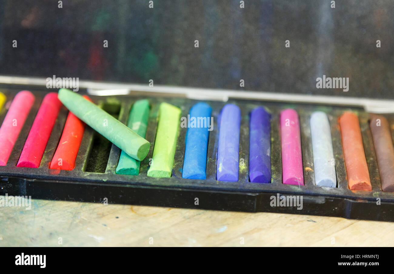 Detail of an open box of artist's pastels, used Stock Photo - Alamy