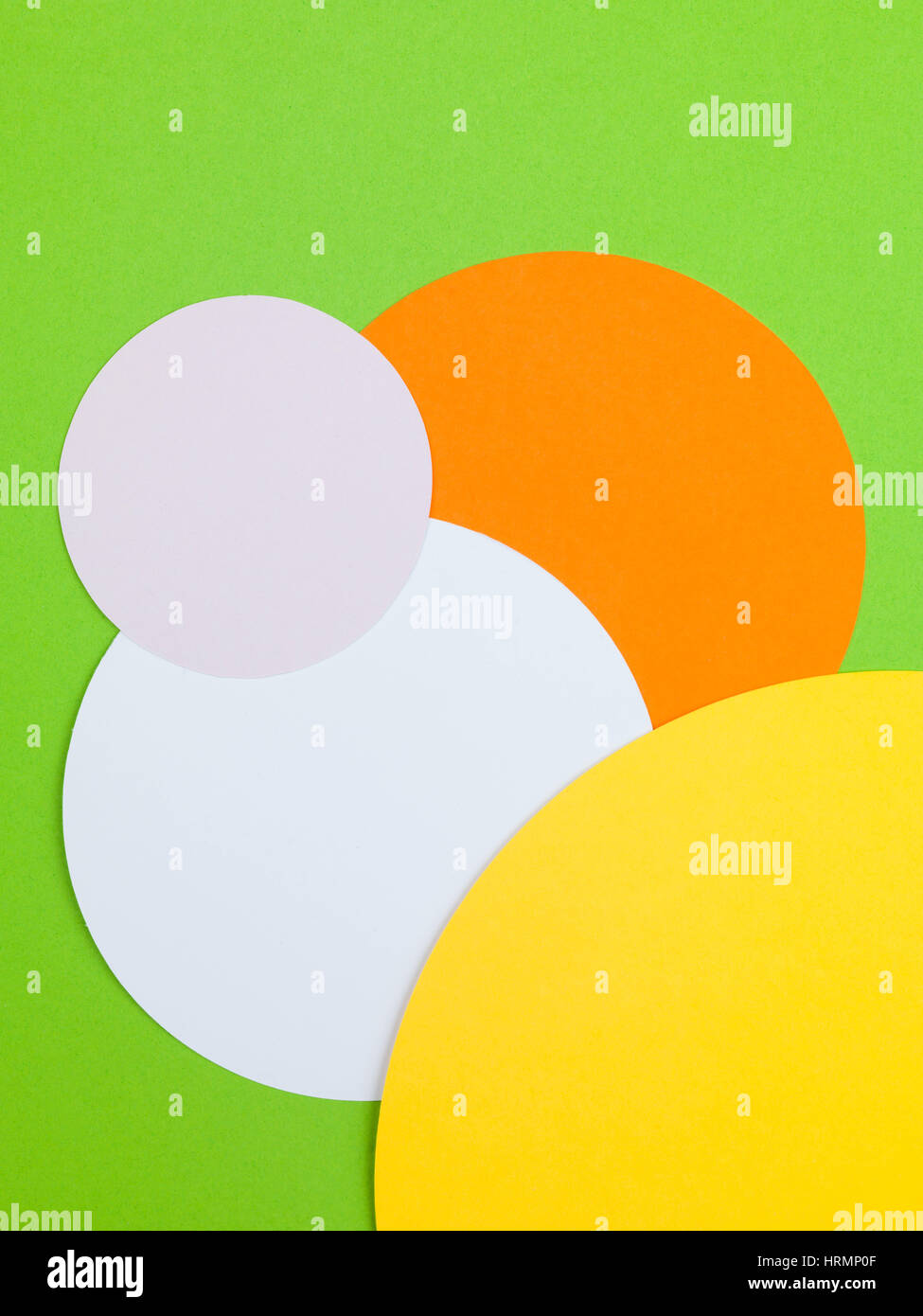 Illustration of Four Colored Circles Against a Green Background Stock ...